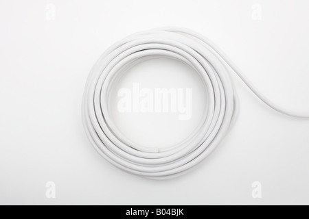white color power cord cable plugged into wall Stock Photo - Alamy