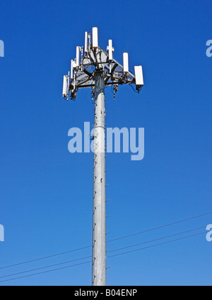 Cell phone relay tower. Metal mast. Metal structure with mounted relays ...