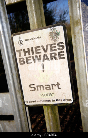 Thieves Beware Smart Water sign Stock Photo - Alamy