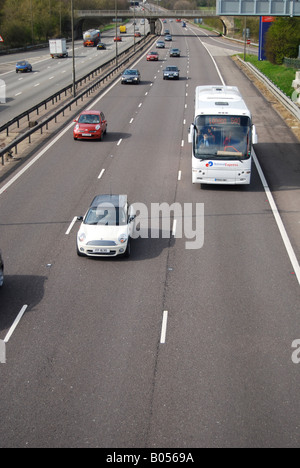 M1 motorway cars coach lorries fast lane stormy sky Stock Photo ...