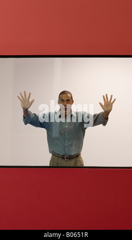 Businessman screaming behind office window Stock Photo - Alamy