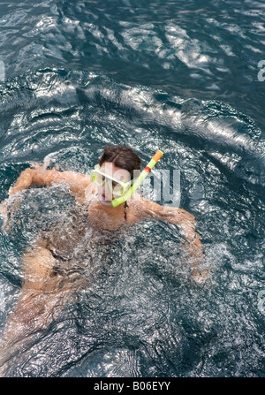 Young woman goes skin diving Stock Photo - Alamy