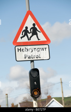 Bilingual Welsh-English school road sign with red dragon symbol and ...