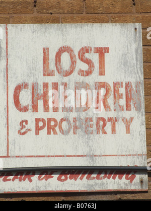 Lost children, lost property and information signs Stock Photo - Alamy