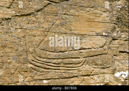 An ancient carved outline of a Birlinn and ship introduced by the norse ...