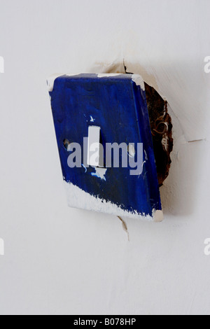 broken blue light switch close up Stock Photo - Alamy
