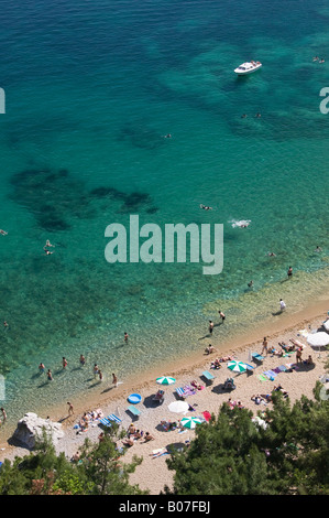 Aerial view of Budva Montenegro beach with sunshades and swimmers Stock ...