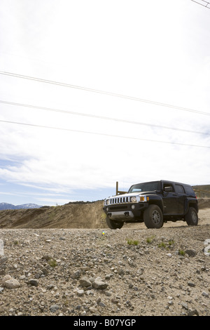 Hummer H3 being driven off-road in desert Stock Photo - Alamy