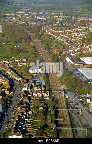 Aerial view of a railway line meandering through a densely populated ...