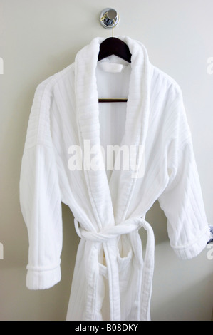 Robe hanging behind door Stock Photo - Alamy