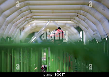 Horse racing jockey in starting boxes Stock Photo - Alamy