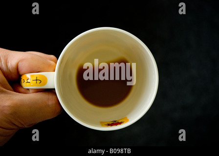Cup almost empty Stock Photo - Alamy