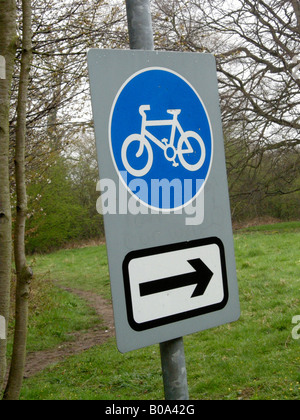 right pointing cycle route sign giving directions and distances to ...