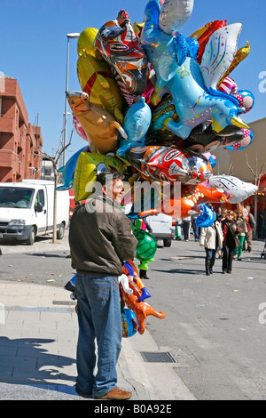 Man selling balloons helium childhood colorful cheerful celebration ...
