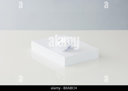 One white crumpled paper ball over isolated background Stock Photo - Alamy