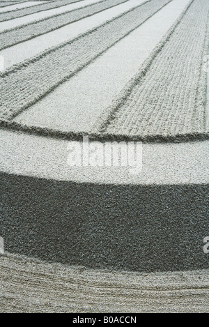 Zen background of raked sand with diagonal parallel lines on the lower ...