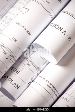 Closeup of rolled up paper copies of architectural floor plans for a ...
