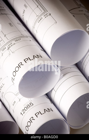 Closeup of rolled up paper copies of architectural floor plans for a ...