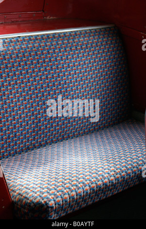 Interior upper deck of London Routemaster bus. Wide shot from rear ...