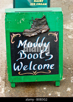 Muddy Boots Welcome A welcoming Sign outside a Malham Cafe in Stock ...
