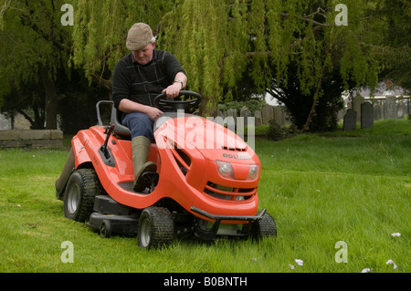 Cutting grass at graveyard, graveyard grass cutting, ride on lawnmower ...