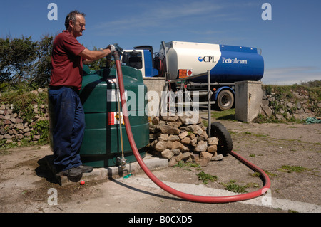 CPL oil road tanker delivering domestic heating oil in rural location ...