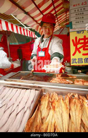 Fish vendor in Beijing Stock Photo - Alamy