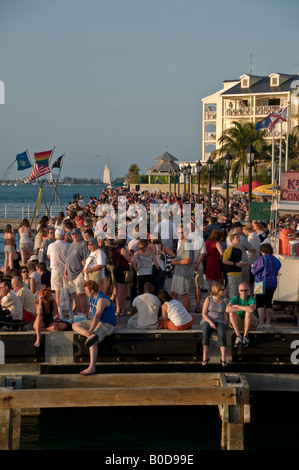 Crowd of tourists at the Key West Sunset Celebration waiting in the ...