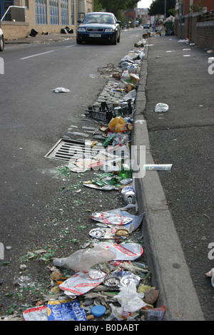 Litter on the street Stock Photo - Alamy