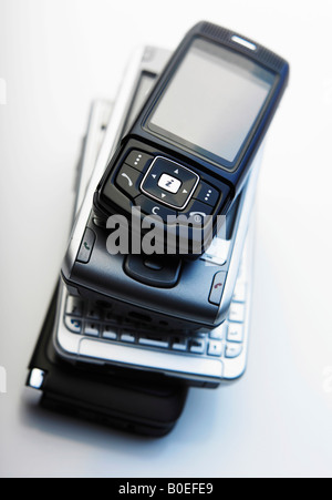 A variety of several mobile cell phones with a shallow depth of field ...