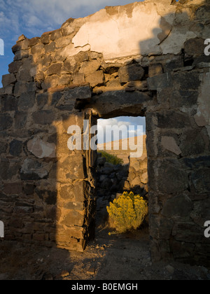 Stone doorways at the old Wickahoney stage stop frame the harsh ...