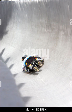 Skeleton racer on the ice track, St Moritz, Engadin, Grisons ...
