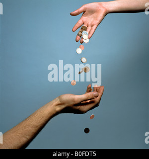 Hand donating money to charity Stock Photo: 274300133 - Alamy