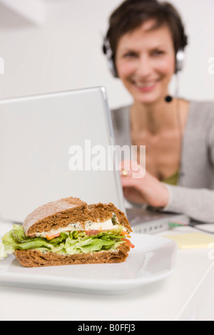 happy germany female customer looking for lipstick in cosmetics shop ...