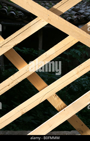 improvised temporary barrier with planks of wood Stock Photo - Alamy