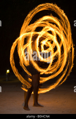 This long-exposure photograph shows women taking mobile phone pictures ...