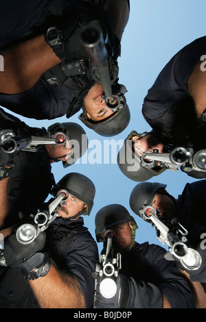 Group portrait of Swat officers standing in circle Stock Photo - Alamy