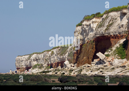 Old Hunstanton Cliffs, coloured layers, low tide, Norfolk. Striped ...
