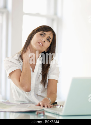 Business woman, stress and laptop with neck pain, tired and injury from ...