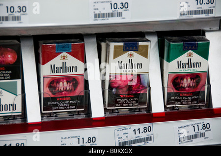 Cigarette display in convenience store Stock Photo - Alamy