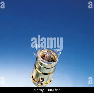 Broken Lightbulb in the socket against blue background Stock Photo - Alamy