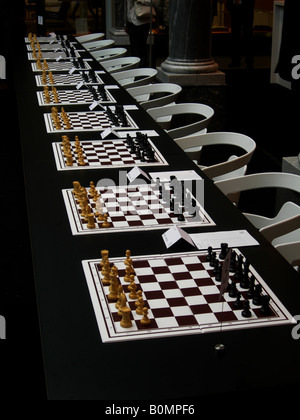 simultaneous chess game many boards figures Stock Photo - Alamy