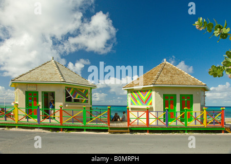 Colorful kiosks for selling souvenirs to tourists in Cockburn Town ...