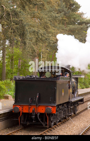 Classic steam engine at Holt station platform 92203 Black Prince Stock ...