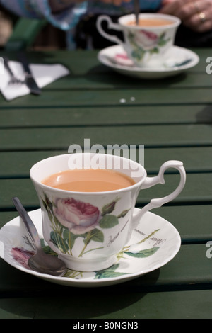 Cup of Tea on Outdoor Picnic Table Stock Photo - Alamy