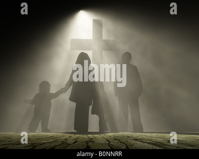 Christian family prayer before cross Stock Photo - Alamy