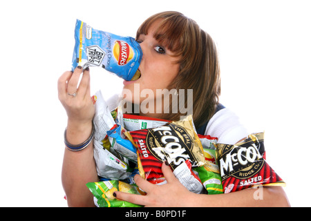 Teenage Girl with Pile of Crisps Model Released Stock Photo - Alamy