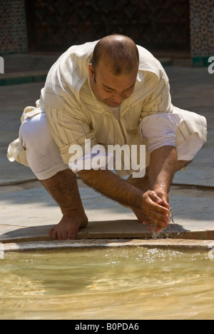 Muslim man washing before prayers at a mosque, Istanbul, Turkey Stock ...