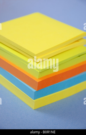 A stack of multi-coloured adhesive notepads Stock Photo - Alamy