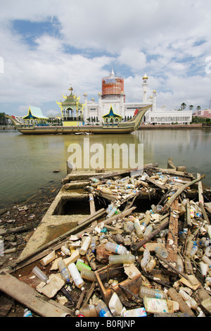 Garbage and polluted water in front of urban slum dwelling in Nha Trang ...